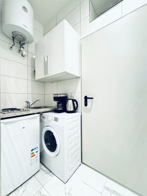 Estúdio básico | Cozinha americana privada | Frigobar, cooktop