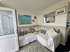 Chalé, 1 quarto, para fumantes, varanda | Sala de estar
