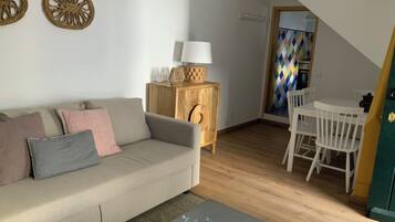 Casa família, 1 cama Queen, varanda | Área de estar