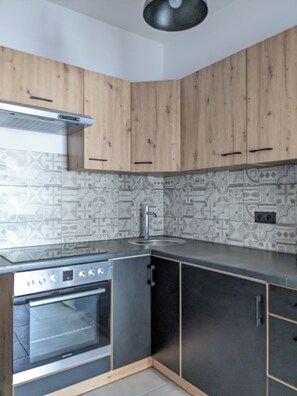 Apartamento Comfort em Condomínio Fechado, varanda, Vista para a cidade | Cozinha privada | Minifrigorífico, um micro-ondas, uma placa de cozinha 