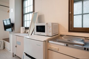 Quarto Duplo Deluxe, vista para a baía | Cozinha privada