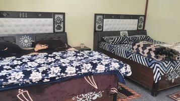 Quarto família | Camas extras/dobráveis (sobretaxa), roupa de cama