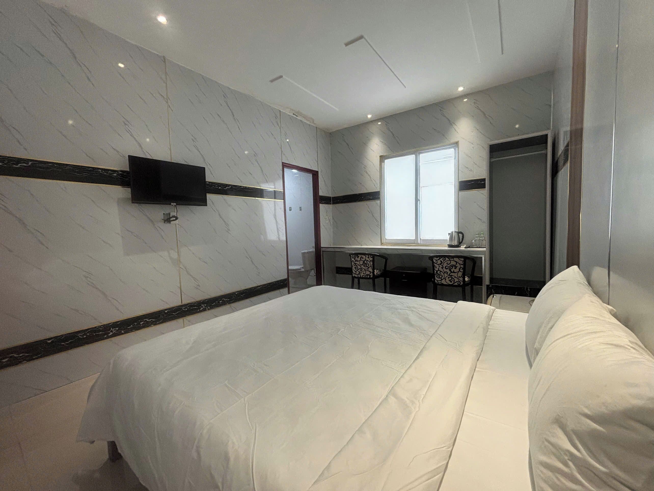 Quarto casal standard | Cortinas blackout, Wi-Fi de cortesia