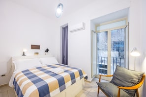 Apartamento Clássico | Cortinas/cortinados opacos, ferro/tábua de engomar, Wi-fi grátis