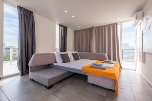 Apartamento, 1 quarto, varanda, Vista para a cidade | Sala