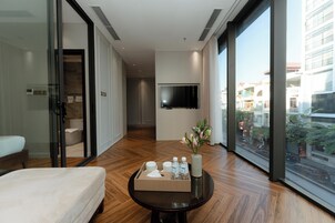 Apartamento Executivo, 2 quartos | Sala de estar