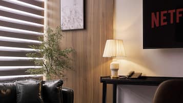 Estúdio Deluxe, cozinha, Vista para a cidade | Vista do quarto