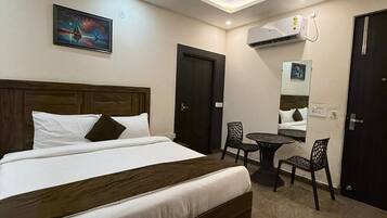 Quarto Deluxe, Vista para a cidade | Ferro/tábua de engomar, Wi-fi grátis