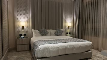 Quarto Triplo Deluxe, vista para a montanha | Secretária, quartos insonorizados, ferro/tábua de engomar, Wi-fi grátis