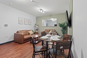 Apartamento Deluxe | Sala de estar