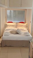 Apartamento Comfort, Vista para a cidade | Cortinas/cortinados opacos, ferro/tábua de engomar, Wi-fi grátis 