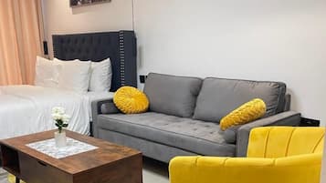 Estúdio Deluxe, 1 cama queen-size, varanda | Sala de estar