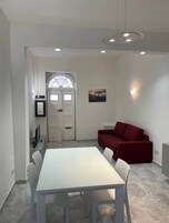 Apartamento, 2 quartos | Sala de jantar
