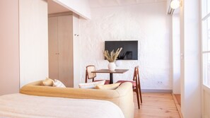 Apartamento superior, vista para a cidade | Parte interna