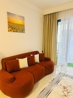 Apartamento Comfort | Sala de estar | Smart TV de 32 polegadas com canais digitais 