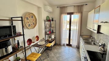 Apartamento Comfort em Condomínio Fechado, vista para o mar | Cozinha privada