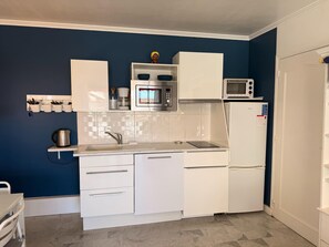 Apartamento | Cozinha privada | Produtos de limpeza 