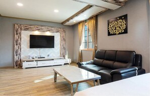 Quarto Quádruplo Básico, vista para o jardim | Wi-fi grátis 