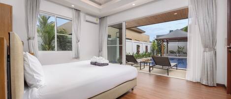 Villa Design, 2 quartos, piscina privativa, vista para a piscina | Cofre no quarto, ferro/tábua de engomar, Wi-fi grátis