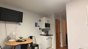 Estúdio conforto | Wi-Fi de cortesia, roupa de cama