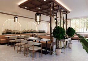 Um restaurante moderno com um balcão extenso, cabines e luminárias pendentes.