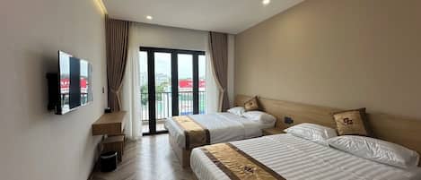 Quarto Duplo ou Twin Básico | Minibar, ferro/tábua de engomar, Wi-fi grátis, roupa de cama fornecida