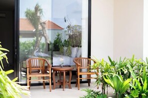 Suite, vista para o jardim | Terraço/pátio interior