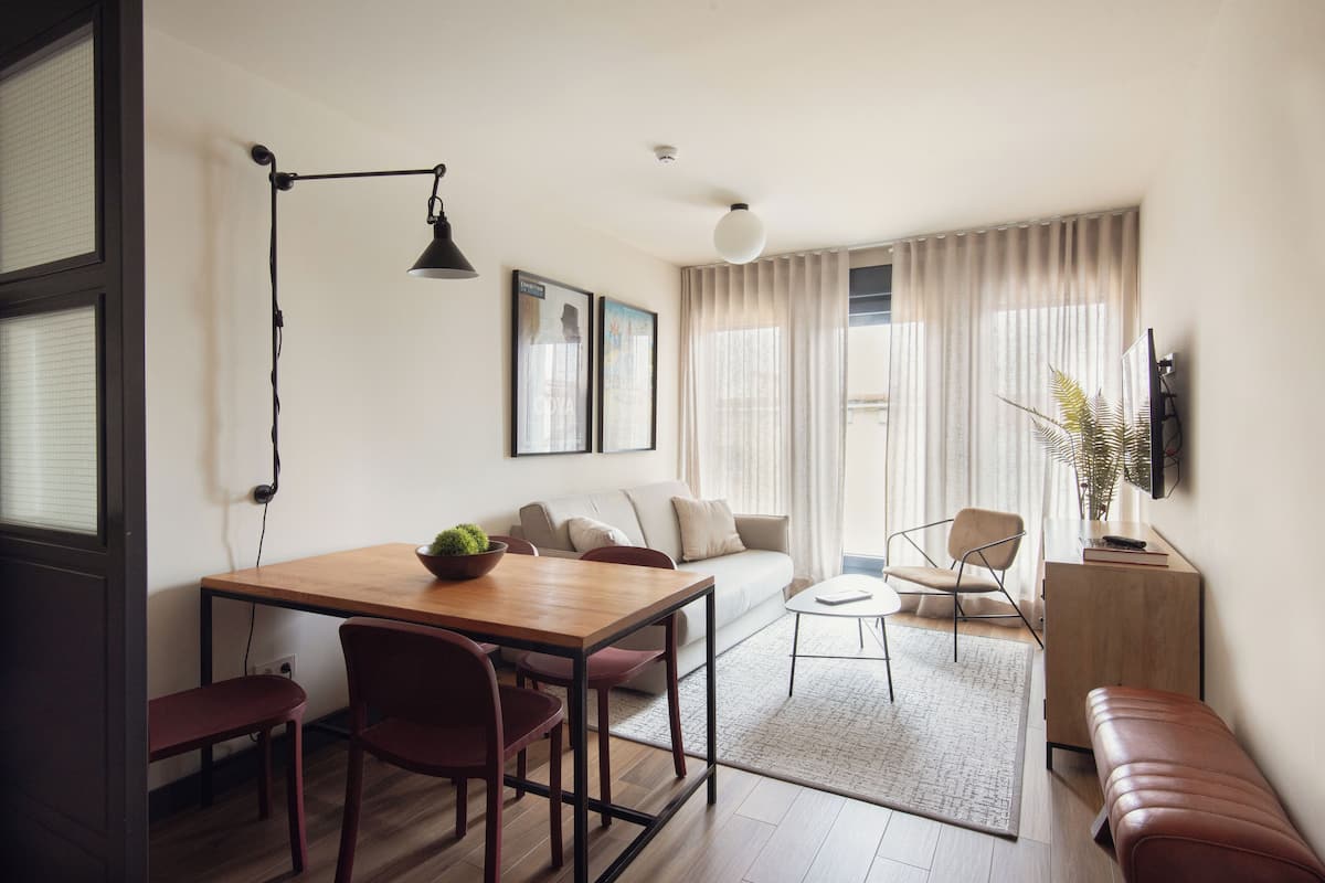 Apartamento, 1 quarto | Sala de estar