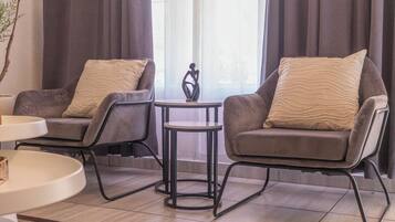 Apartamento conforto, varanda, vista para o jardim | Área de estar