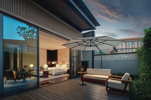 Casa geminada luxo, 1 cama King, aceita animais de estimação, vista para o pátio | Frigobar (abastecido com itens grátis), cofres nos quartos, escrivaninha