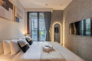 Suite Familiar, 3 quartos, acesso ao Club Lounge, Vista para a cidade | Lençóis de algodão egípcio, roupa de alta qualidade, edredões de penas