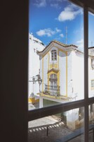 Quarto Twin Básico, varanda, Vista para a cidade | Ferro/tábua de engomar, Wi-fi grátis 