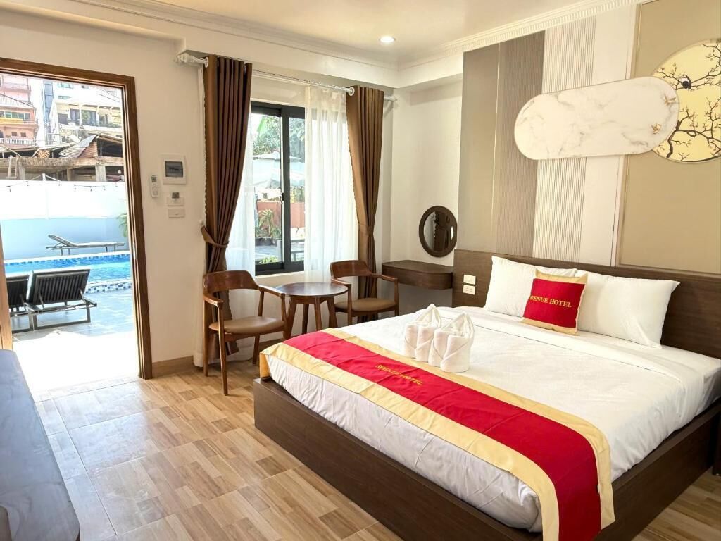 Cofre no quarto, cortinas/cortinados opacos, roupa de cama fornecida 