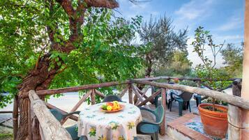 Apartamento conforto, vista para o jardim | Terraço/pátio