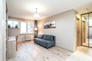 Apartamento | Sala de estar | TV de tela plana 37 polegadas com canais a cabo