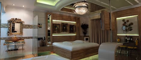 Suite Premier | Minibar, ferro/tábua de engomar, Wi-fi grátis