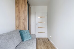 Apartamento Familiar, varanda | Cortinas/cortinados opacos, ferro/tábua de engomar, Wi-fi grátis 