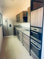 Penthouse Deluxe, varanda, vista para o jardim | Cozinha privada