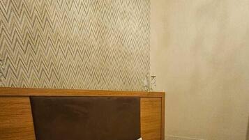 Quarto duplo standard, vista para a cidade | Área de estar