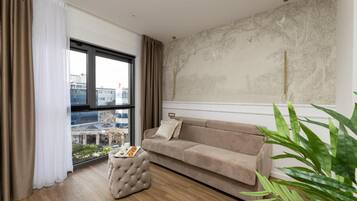 Suite, vista para o mar | Cofre no quarto, secretária