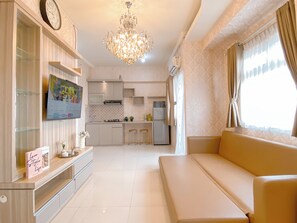 Apartamento standard, 2 quartos | Área de estar