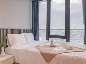 Apartamento standard, 2 quartos | Roupa de cama