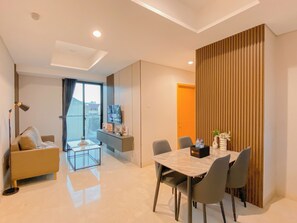 Apartamento standard, 2 quartos | Área de estar