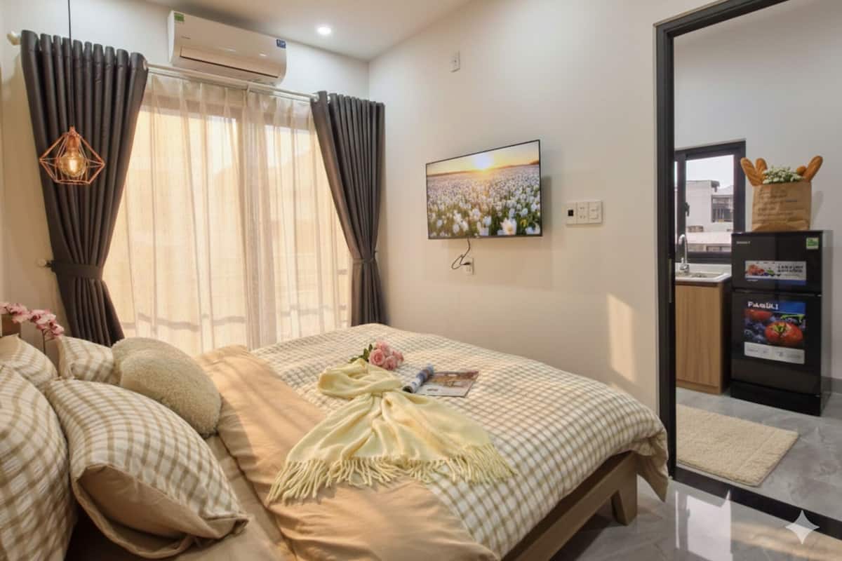 Apartamento Deluxe, 2 quartos, varanda | Secretária, cortinas/cortinados opacos, quartos insonorizados