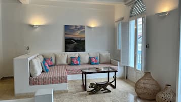 Apartamento, vista para a cidade | Área de estar