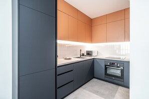 Apartamento conforto | Cozinha americana privada | Cafeteira/chaleira, chaleira elétrica