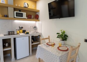 Apartamento luxo, 1 cama King e sofá-cama, cozinha | Cozinha privada