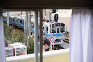 Apartamento standard, sacada, vista para a cidade | Vista do quarto