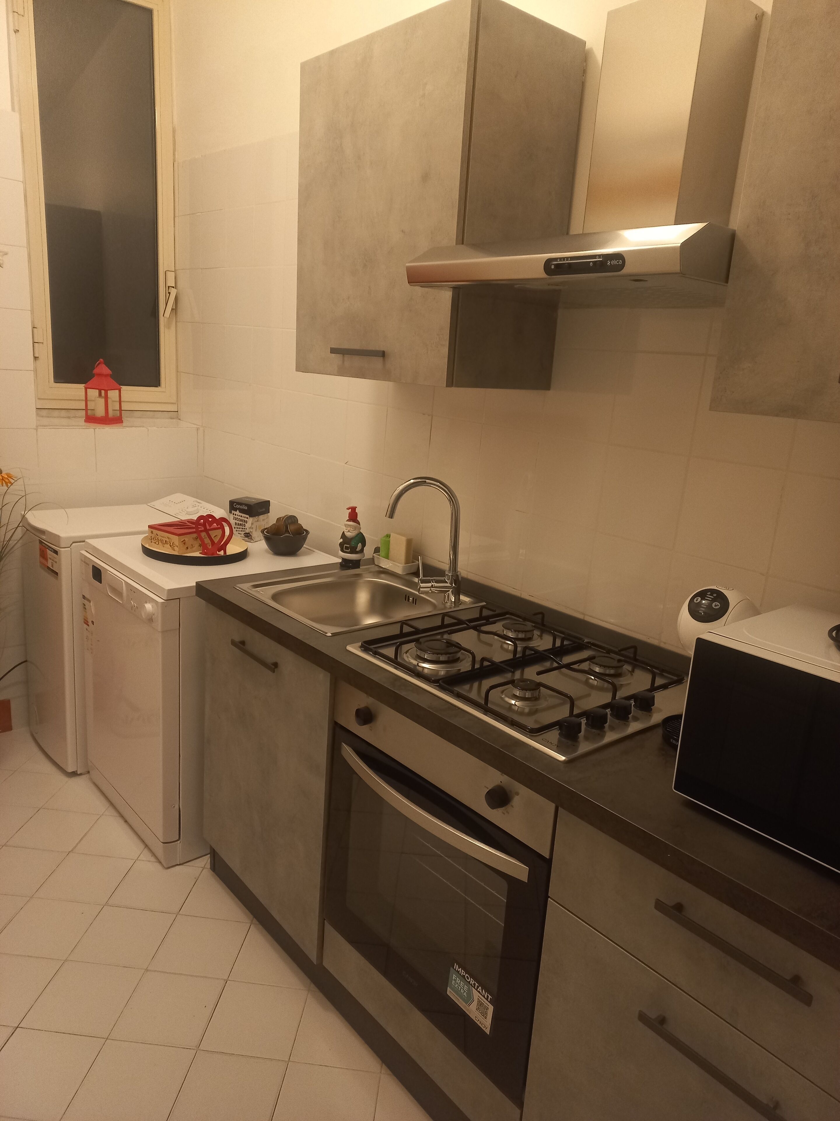 Apartamento Comfort | Cozinha privada | Uma torradeira, Produtos de limpeza, Congelador 