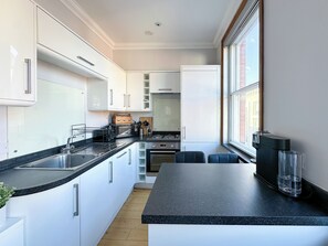 Quarto Quádruplo de Luxo, Vista para a cidade | Cozinha privada